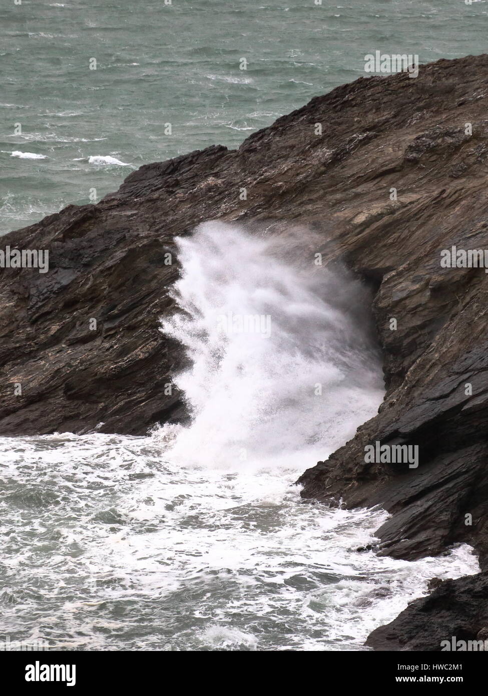 Massive storm surge waves enter seaward cave on tip of Porth Island ...