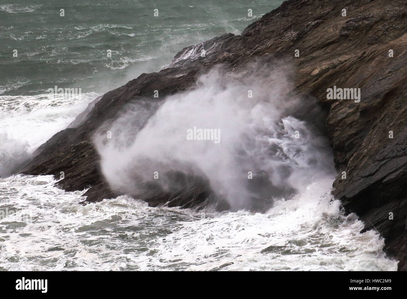 Massive storm surge waves enter seaward cave on tip of Porth Island ...