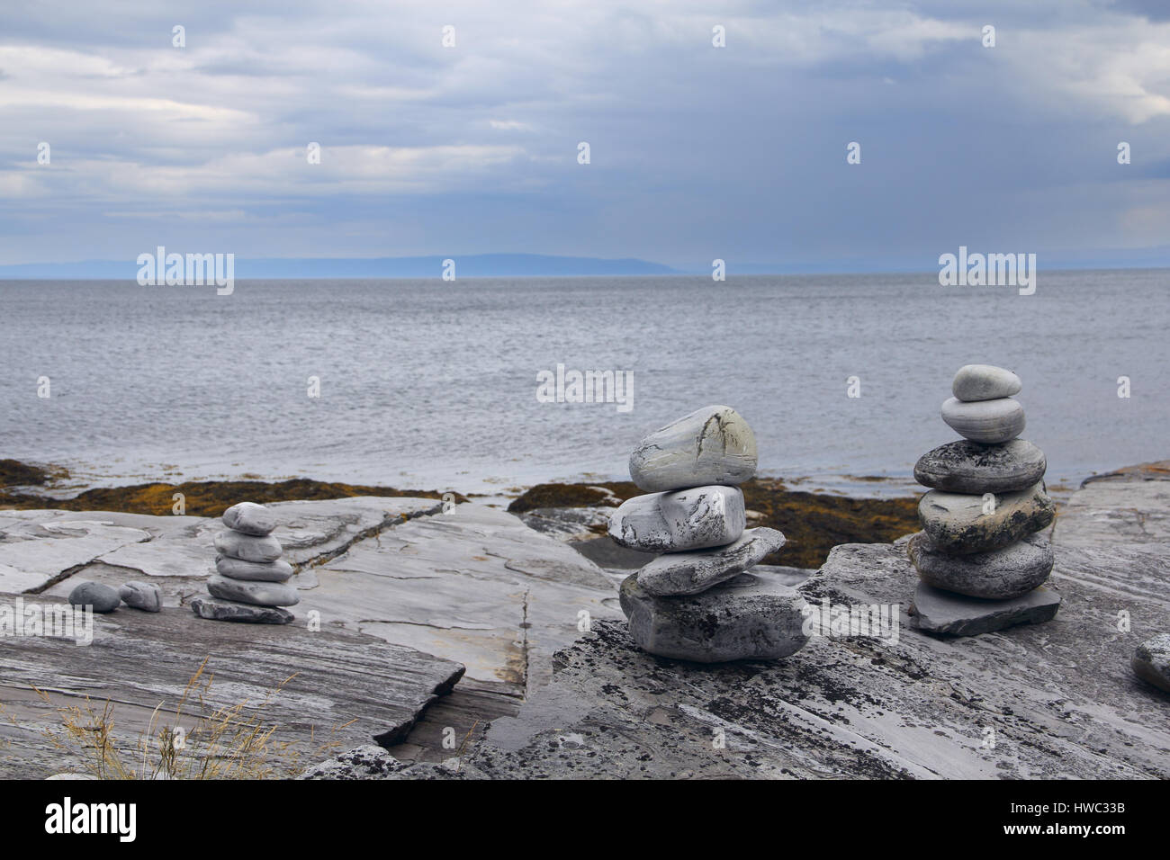 Stack of rocks on ocean coast of northern Norway fjord Stock Photo - Alamy