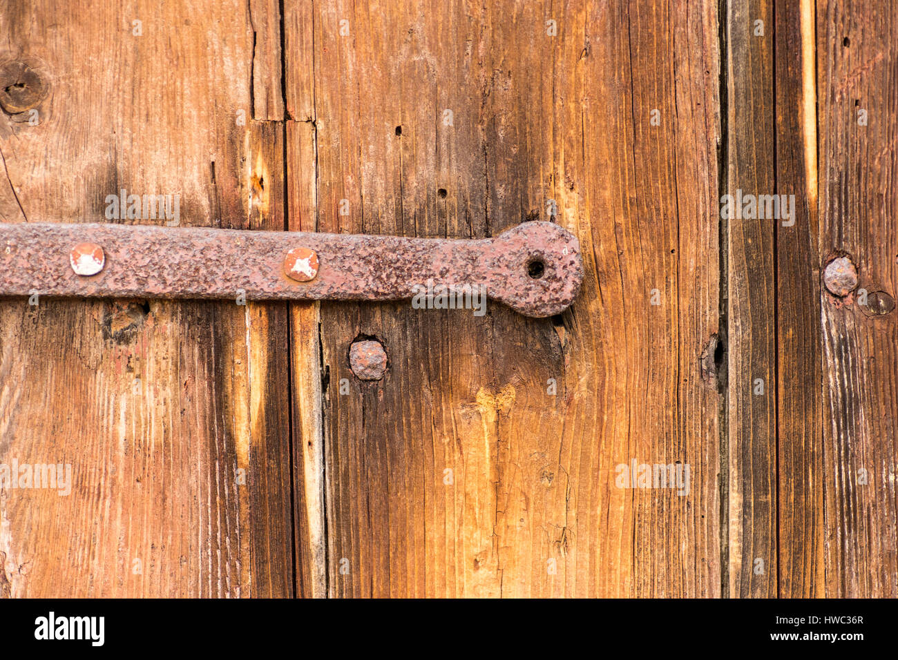 Ancient door hinge on wooden hi-res stock photography and images - Alamy