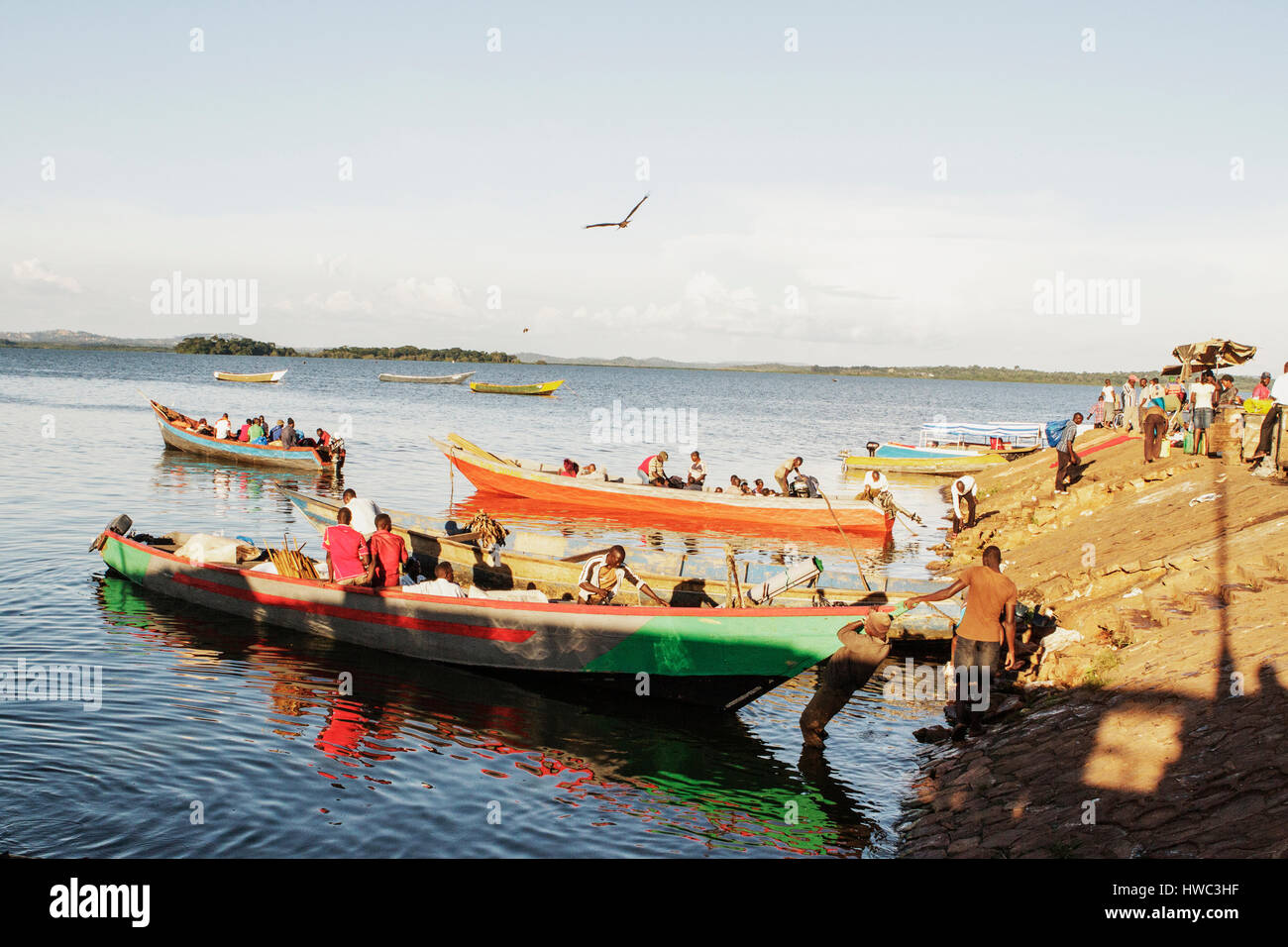 At the landing site in Ggaba, Kampala, local fishermen sell their fish ...