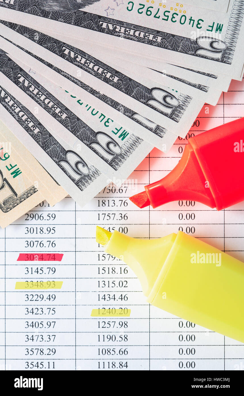 Pair of felt tip pens near money on paper background with digits Stock ...