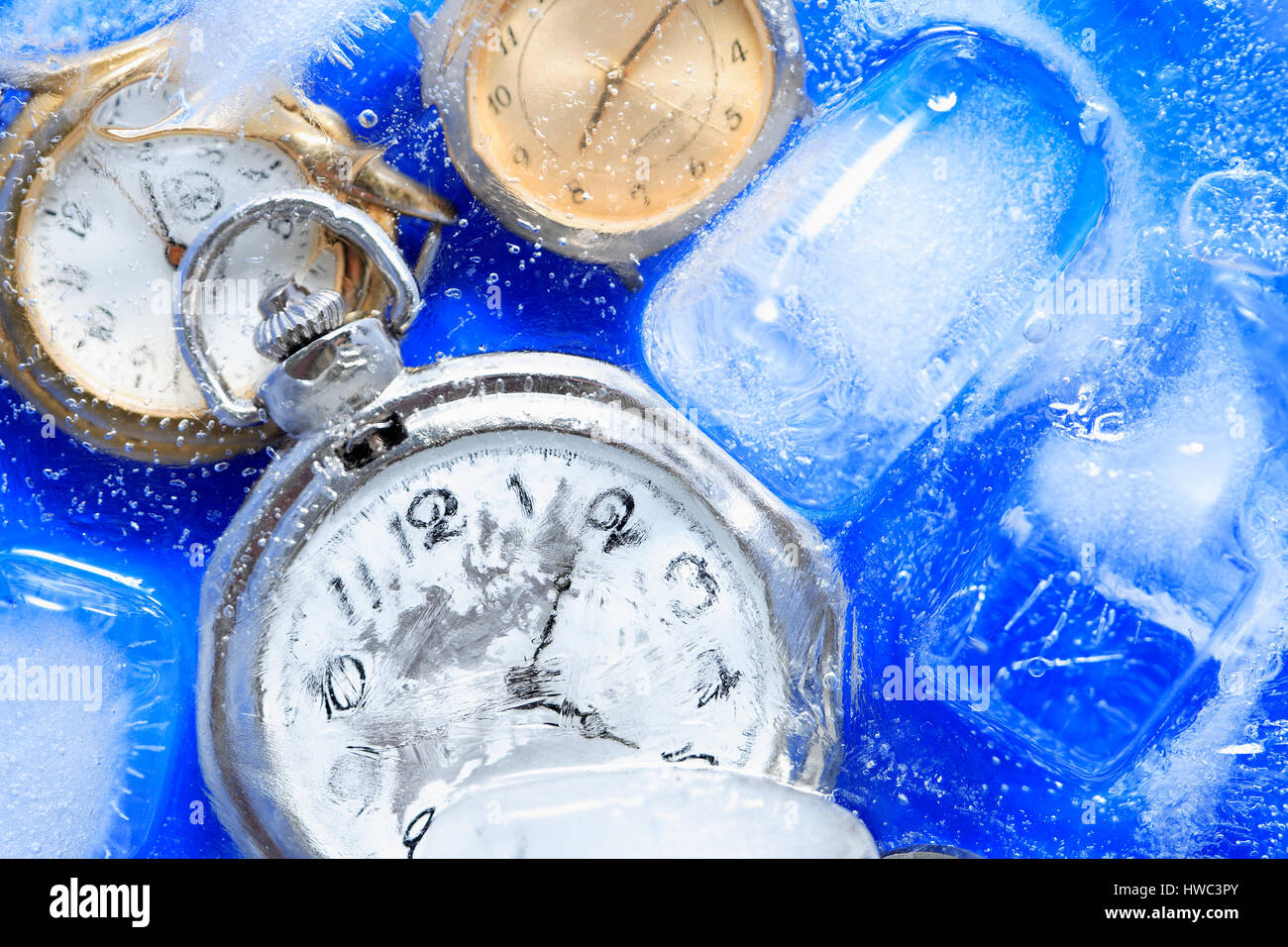 Few watches closeup under frozen water background with ice Stock Photo ...