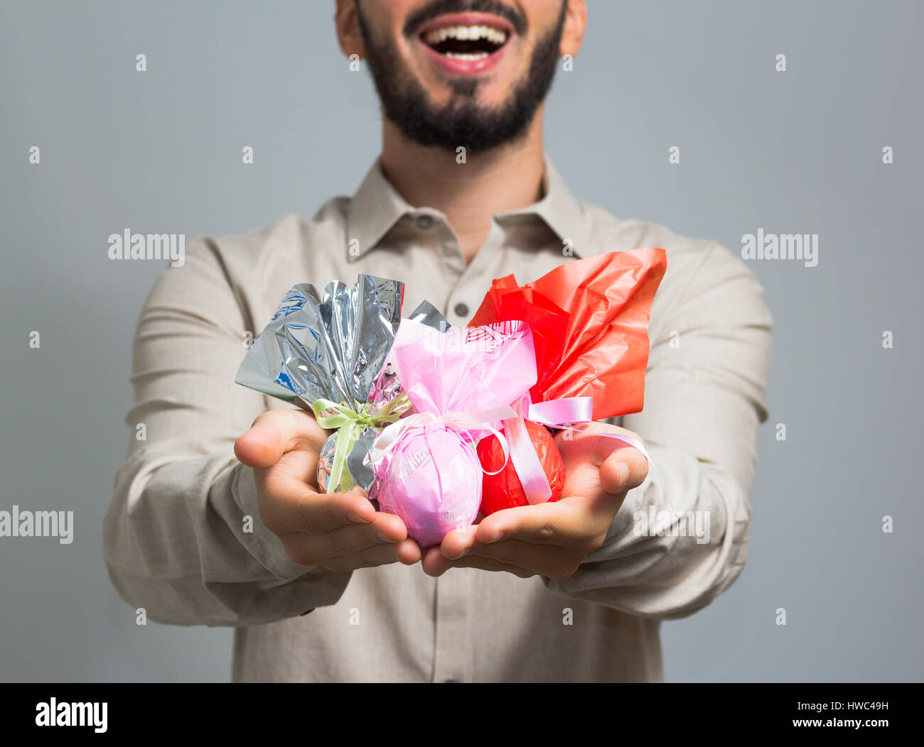 Handing out gift hi-res stock photography and images - Alamy