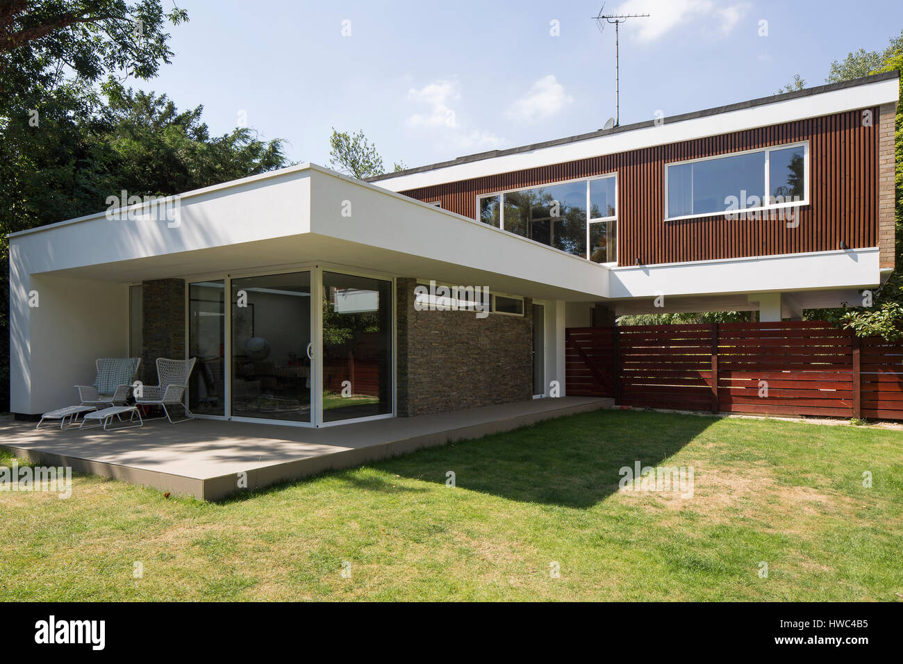 Exterior view of rear facade. Private House, Roydon, United Kingdom ...