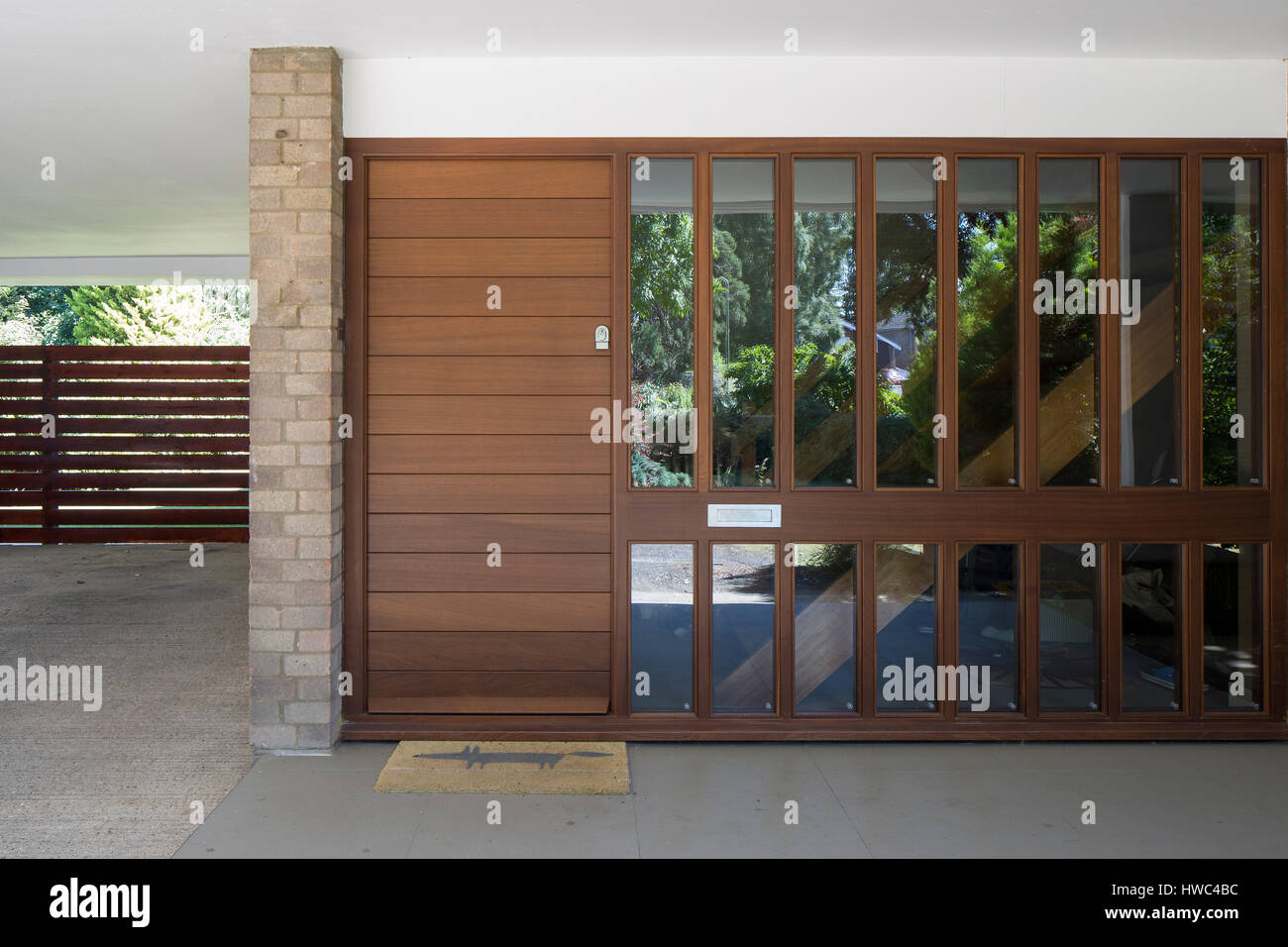 Exterior view of front entrance. Private House, Roydon, United Kingdom ...