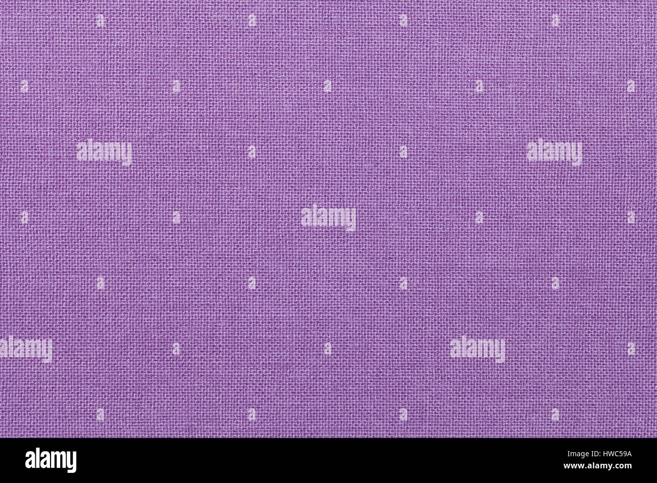 light purple background from a textile material. Fabric with natural ...