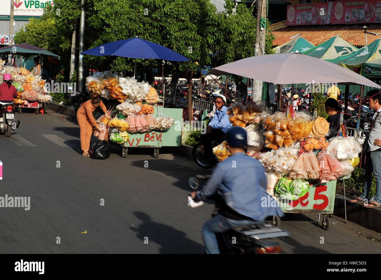 Ho Chi Minh City Viet Nam Vietnamese Street Food At Cho Lon Market Street Vendor Sell Rice ho-chi-minh-city-viet-nam-vietnamese-street-food-at-cho-lon-market-street-vendor-sell-rice