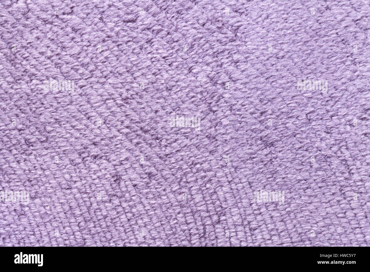 Light purple background from a soft wool textile material closeup ...