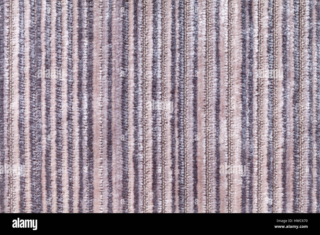 Light gray background of a knitted textile material with pattern of ...