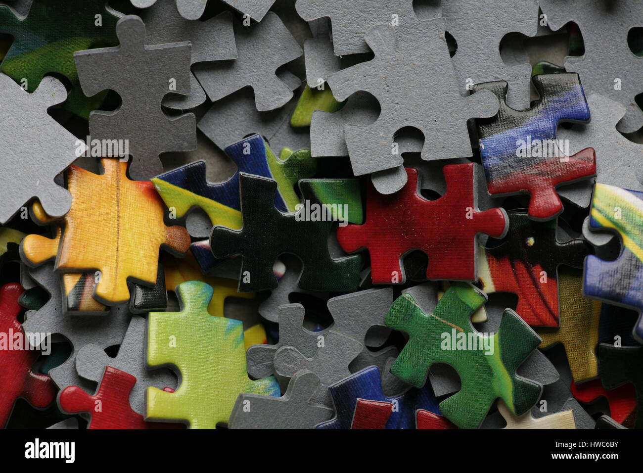 Grey puzzle pieces hi-res stock photography and images - Alamy