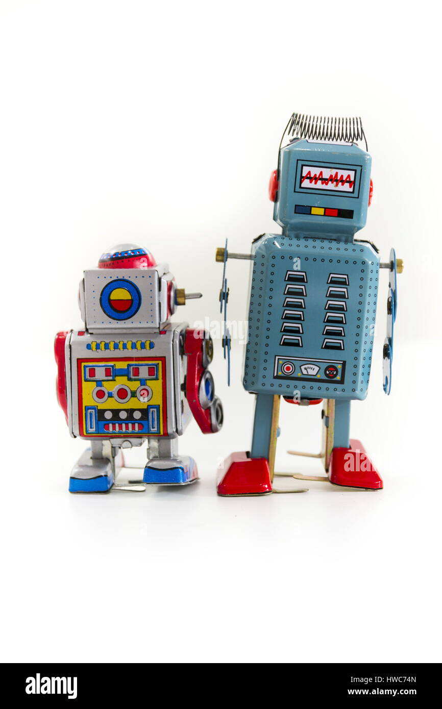 Pair of vintage tin toy robots isolated on white background Stock Photo ...