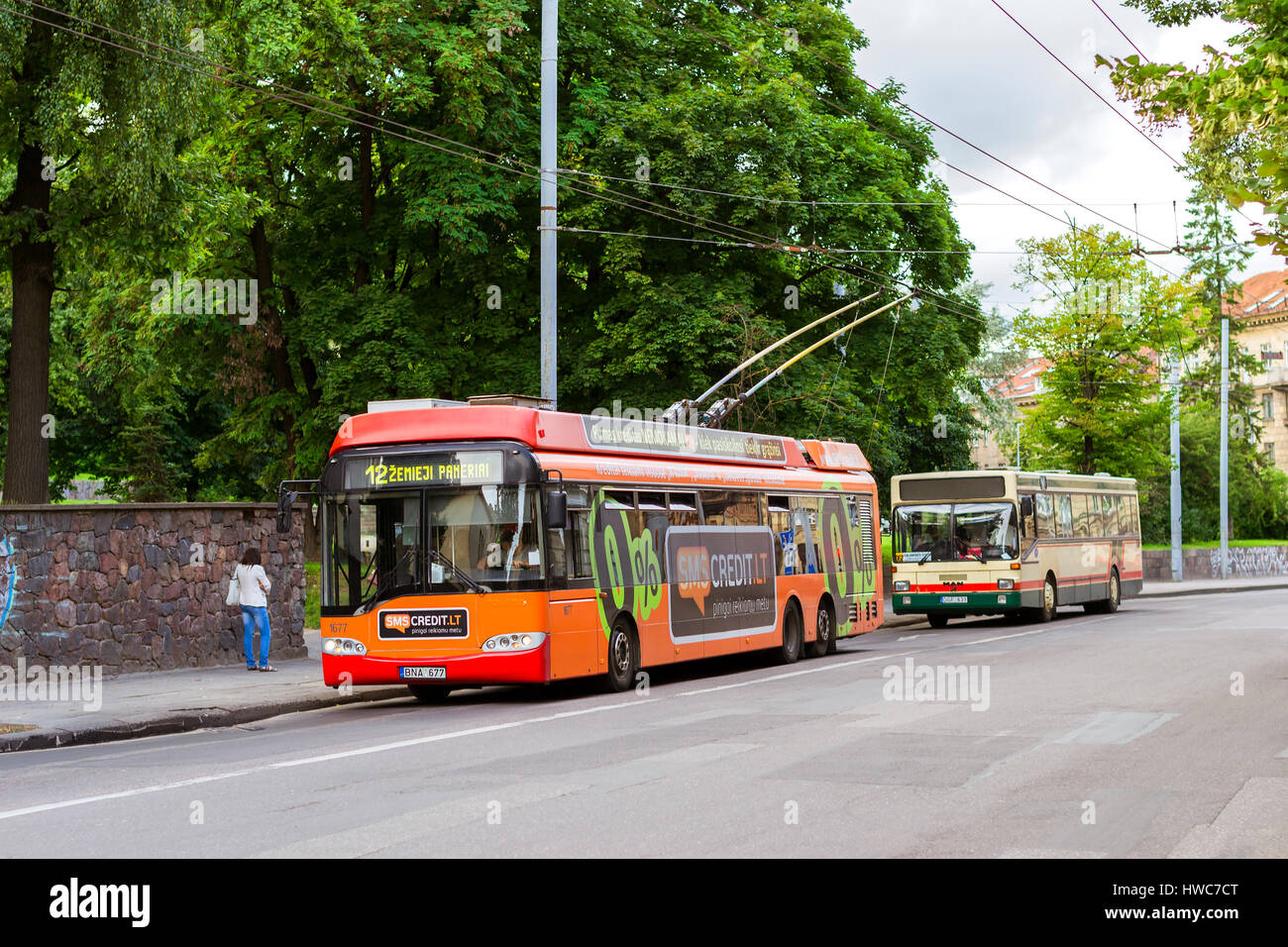 Vilnius, Lithuania - August 8, 2012: Vilnius trolley rides along a busy ...