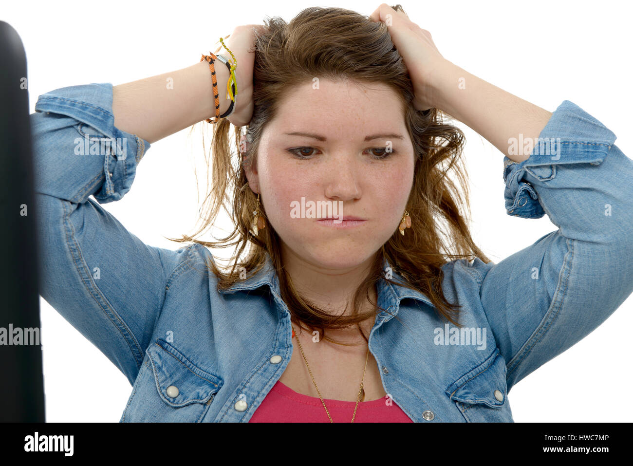 angry young woman working on laptop Stock Photo - Alamy