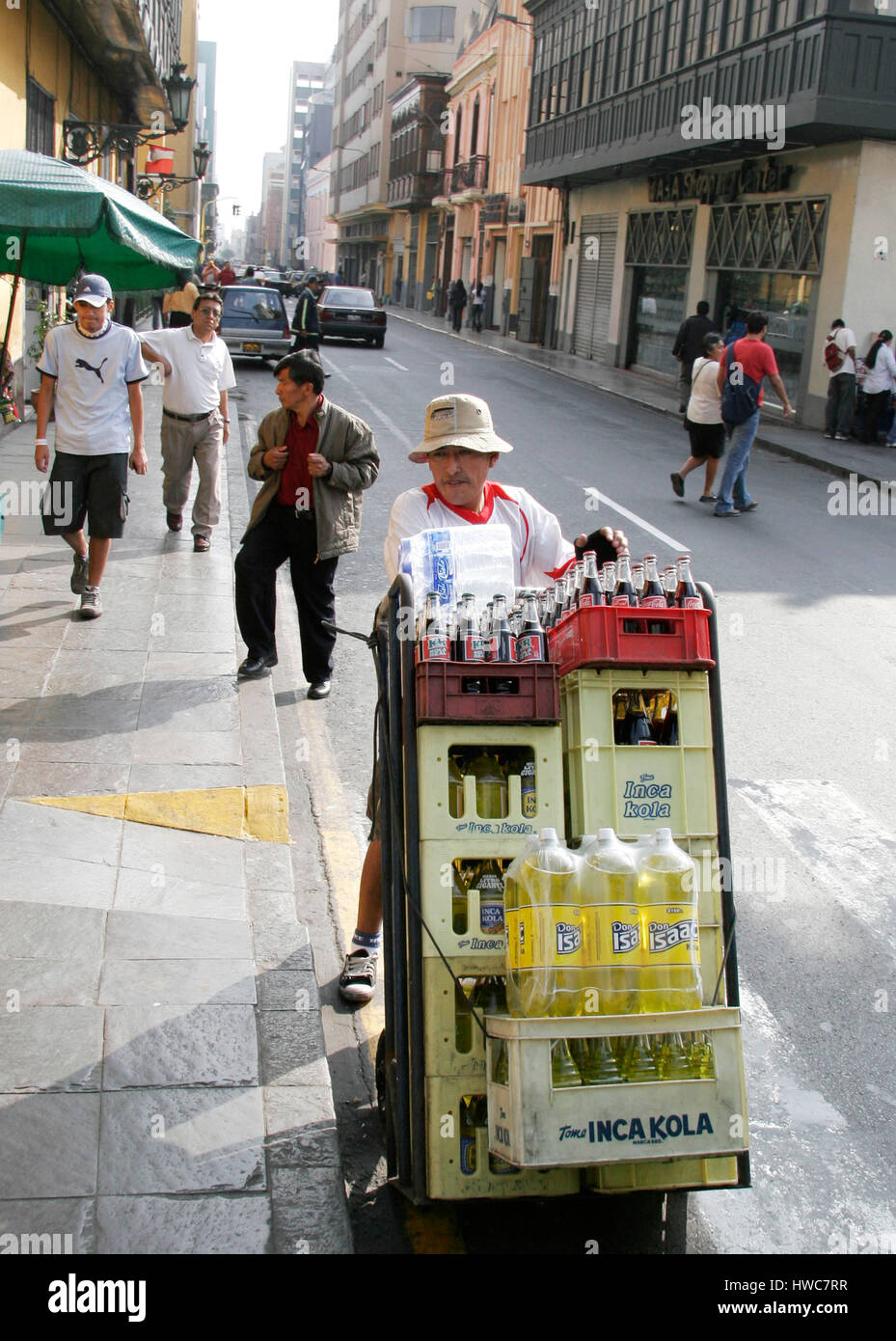 A man delivers beverages in Lima, Peru on November 5, 2005. Photo ...