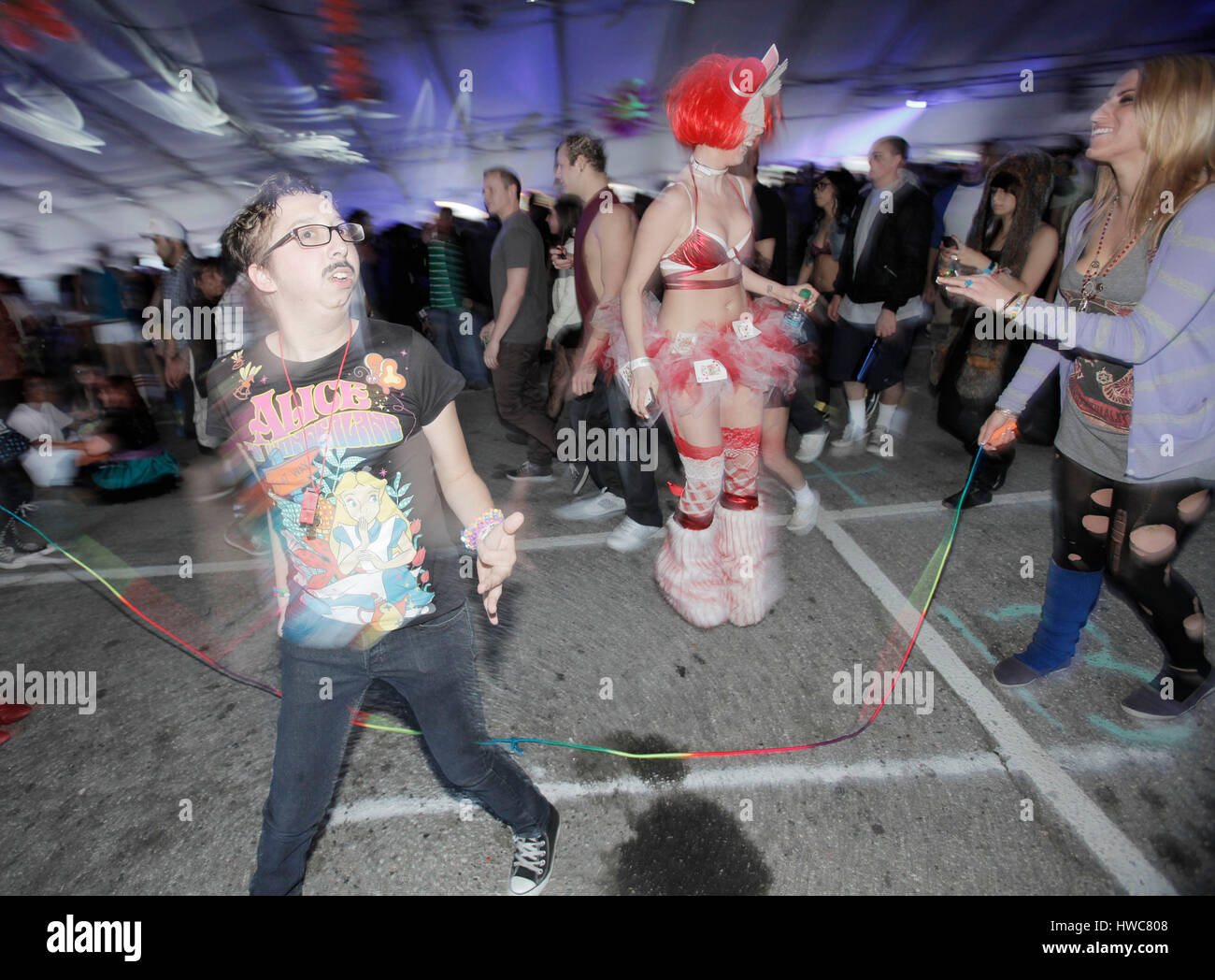 Joseph Pella, left, of Las Vegas, jumps rope at the Beyond Wonderland ...
