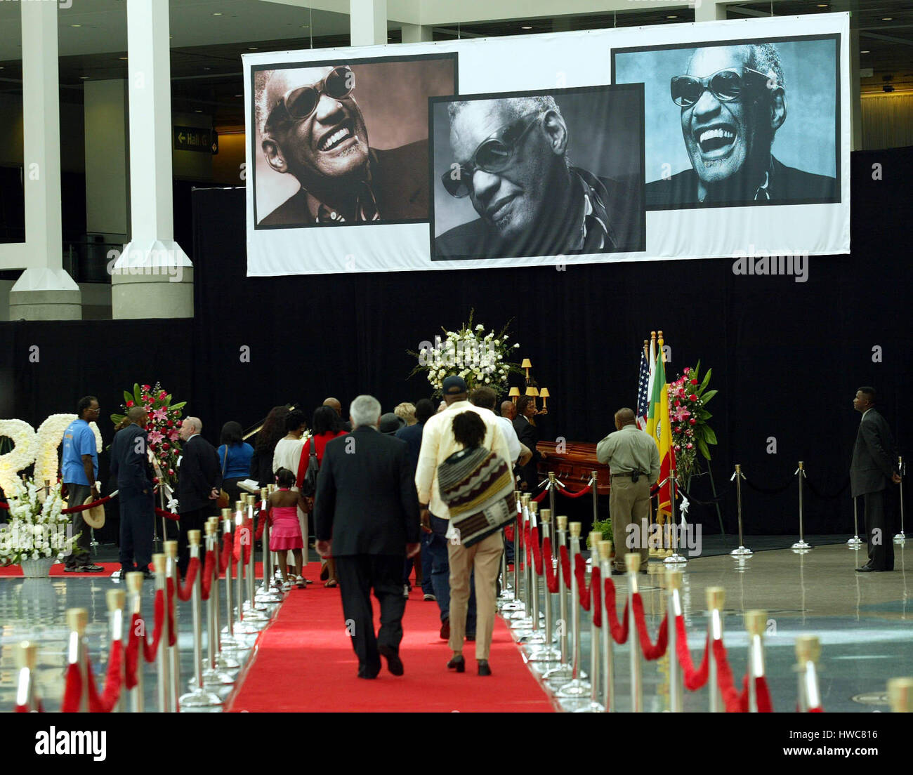 Mourners line up to pay respects for singer Ray Charles at the Los ...