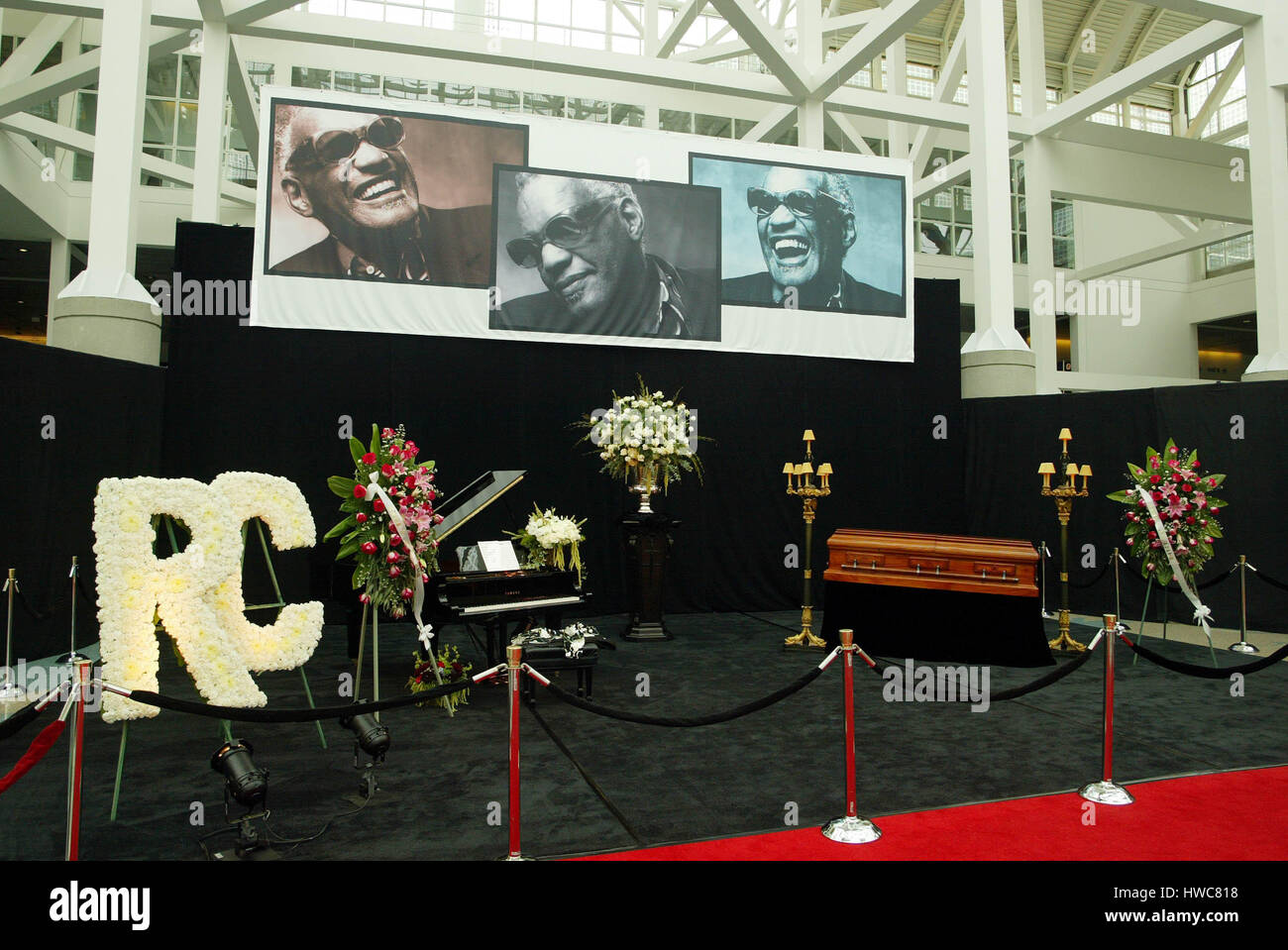 Flowers in the shape of RC, a baby grand piano adorn the area around ...