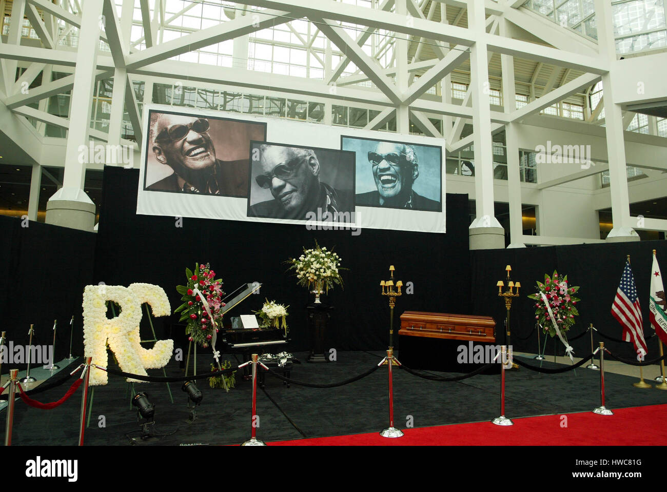 Flowers in the shape of RC, a baby grand piano adorn the area around ...
