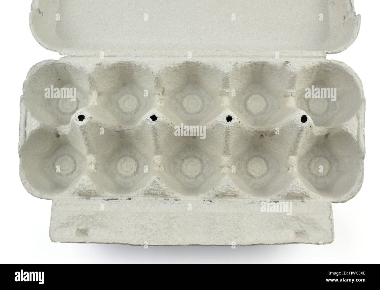 Open cardboard egg box on white background Stock Photo - Alamy