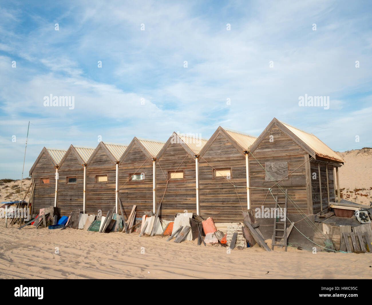 Fisherman shacks on the beach Stock Photo - Alamy