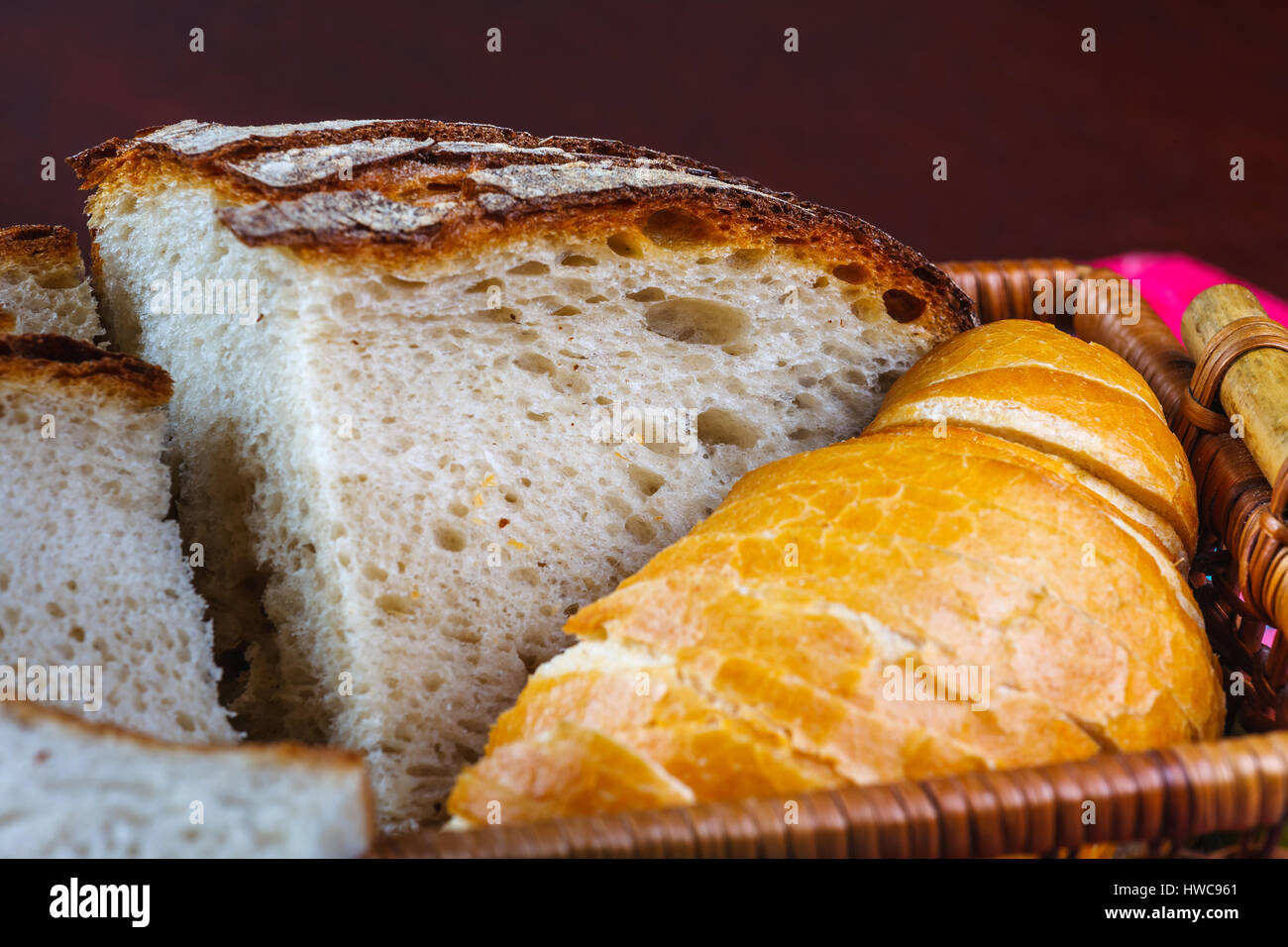 Fresh bread slice on rustic table, close up Stock Photo - Alamy