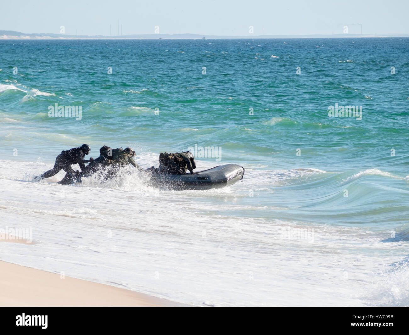 Military training in the seashore in a beach with a zodiac boat Stock ...