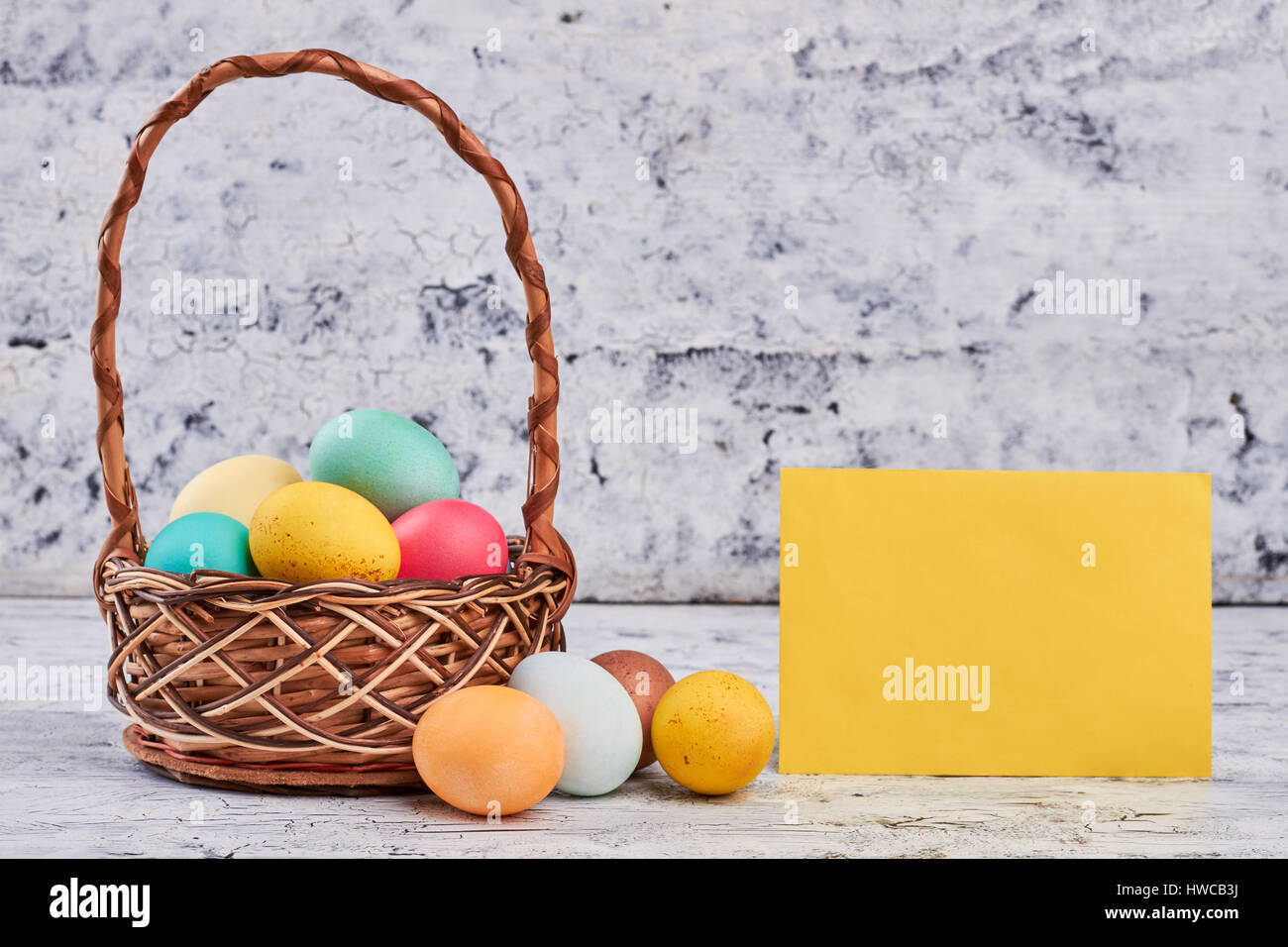 Basket with easter eggs Stock Photo - Alamy