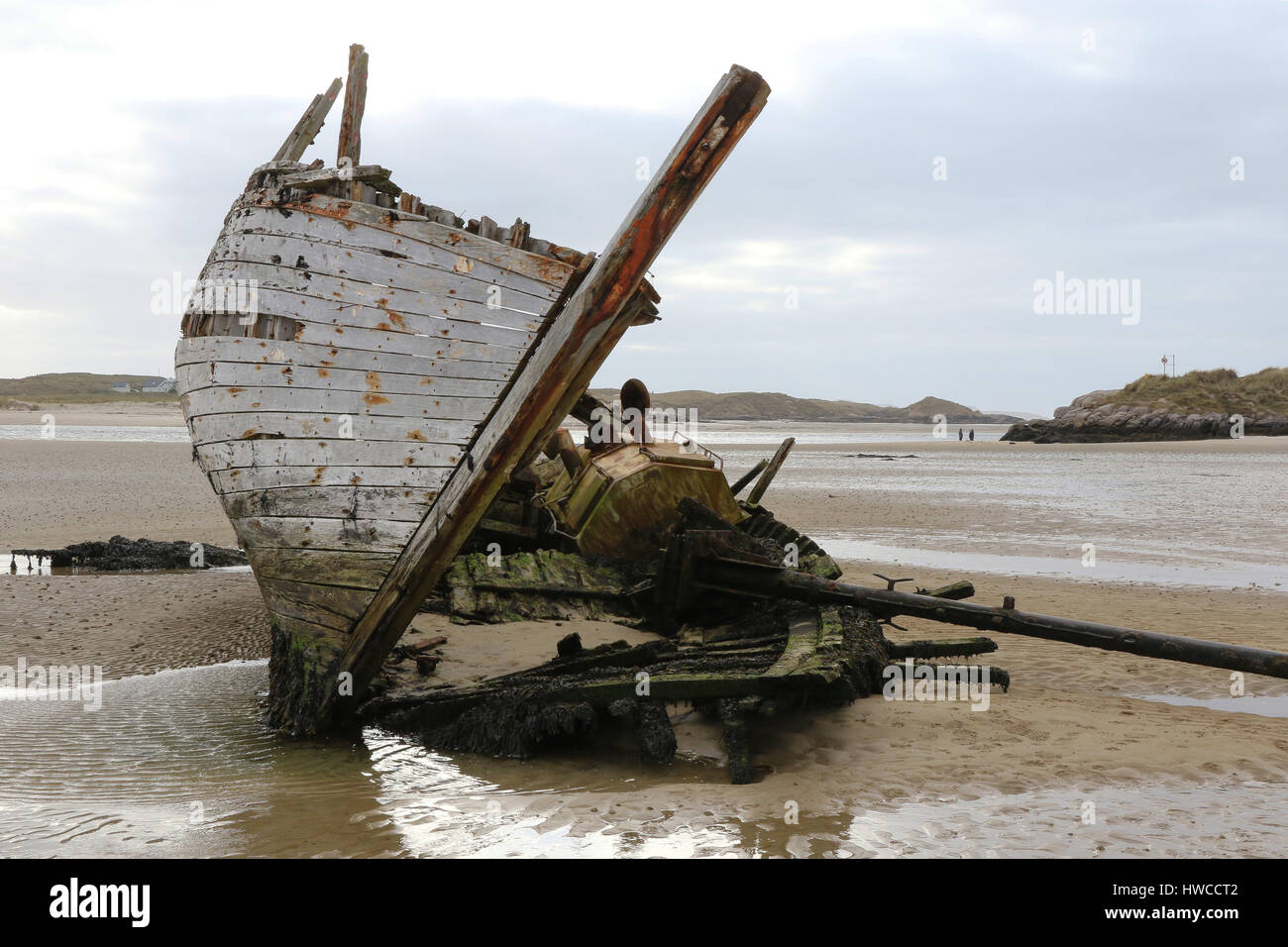 The wreck of a wooden fishing boat at Bunbeg, County Donegal, Ireland ...