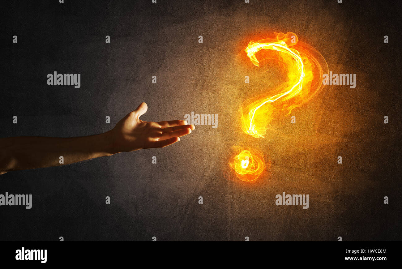 Concept of help or support with fire burning question mark and creation ...