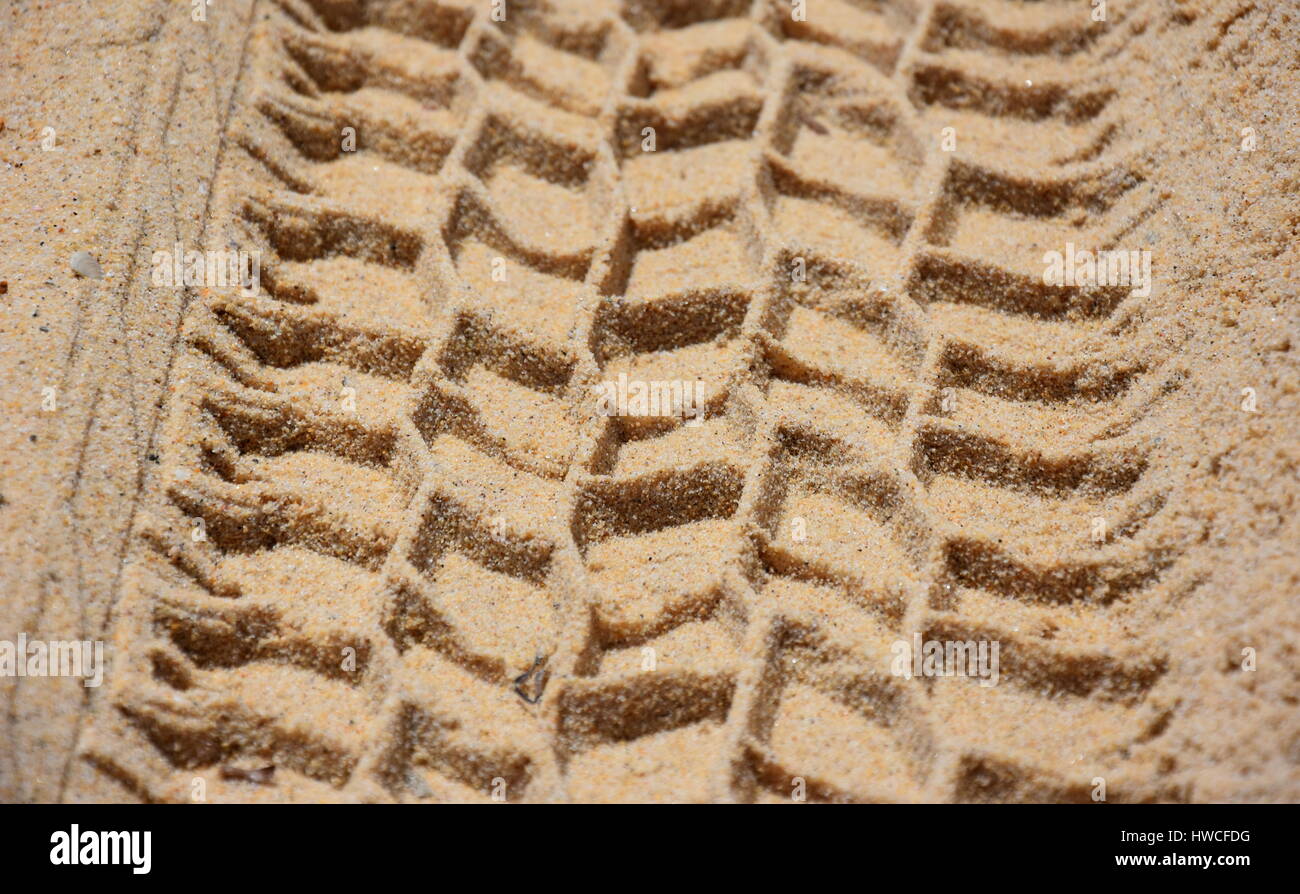 Wheel track in the sand texture. Coast beach sand surface car wheel ...
