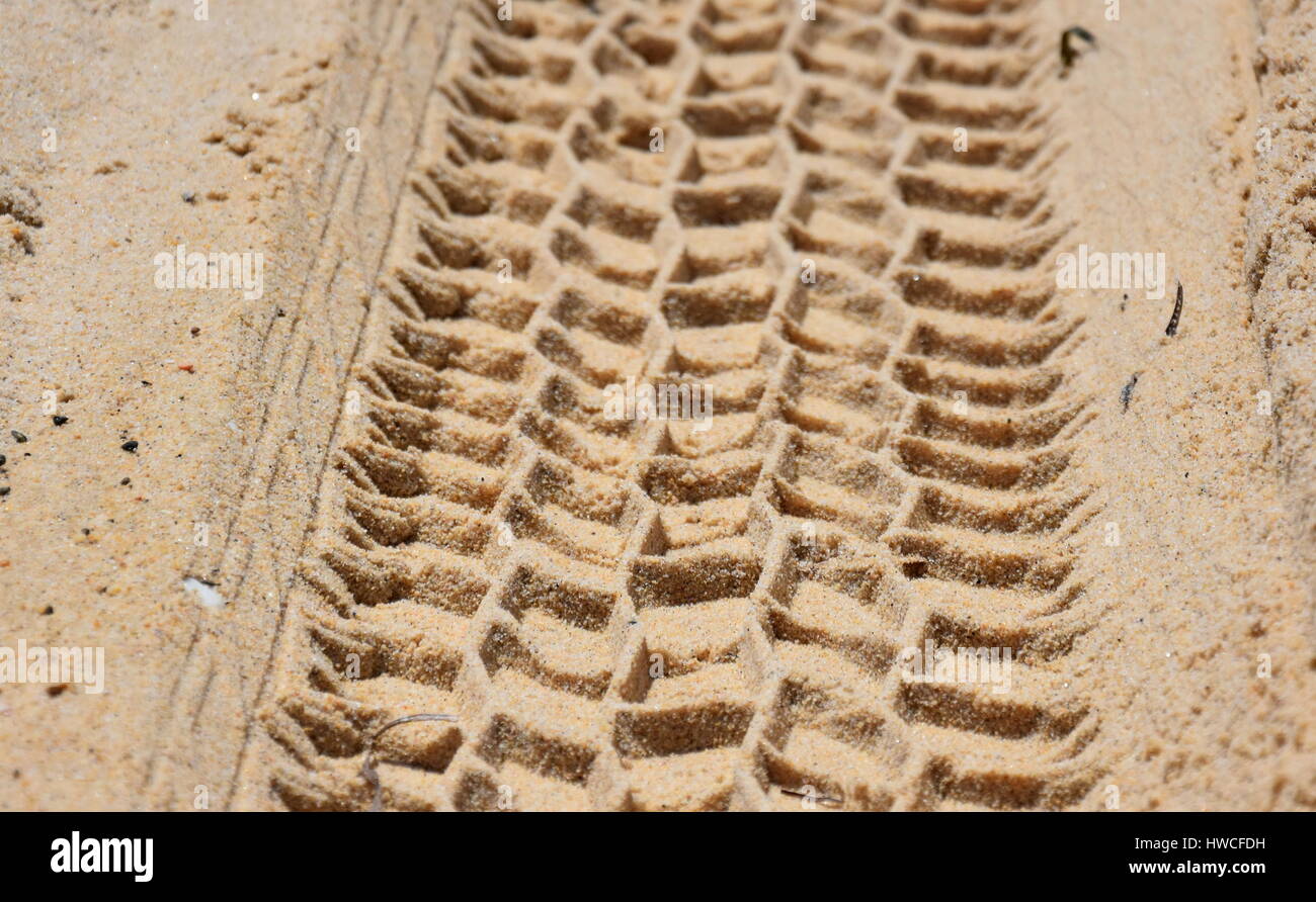 Wheel track in the sand texture. Coast beach sand surface car wheel ...