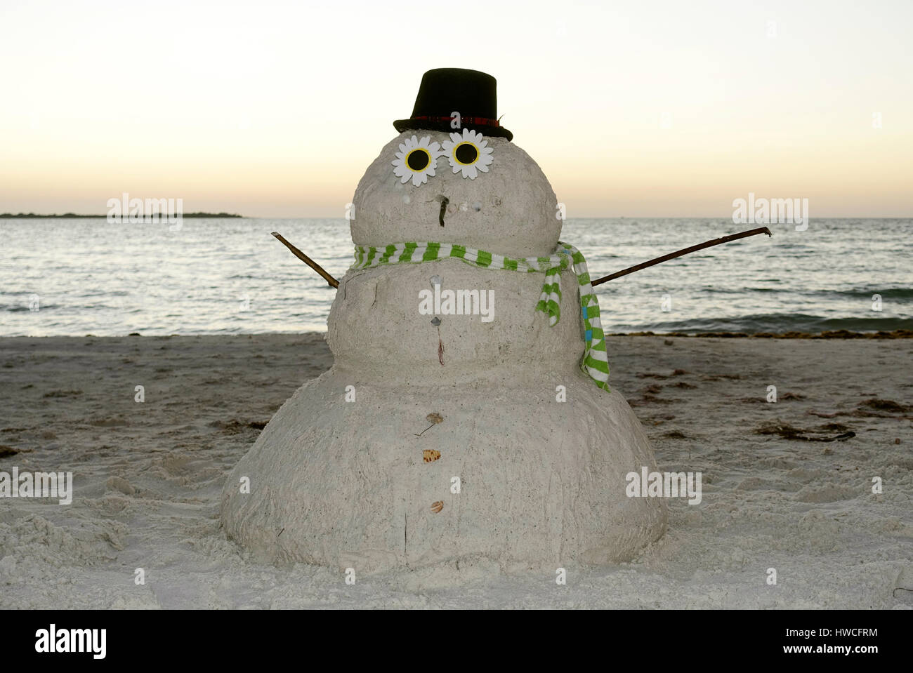 Snowman made sand on beach hi-res stock photography and images - Alamy