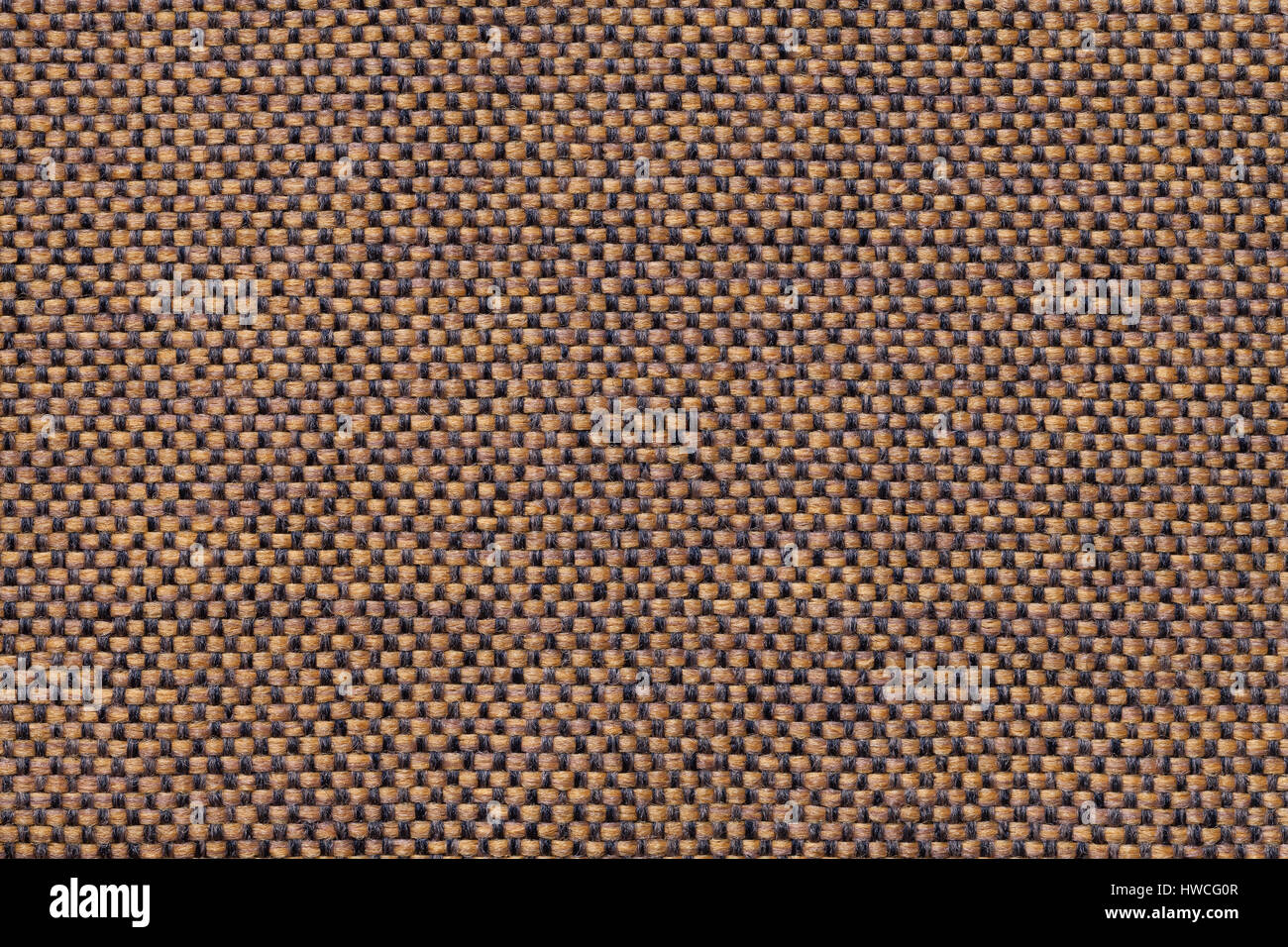 Light brown background with checkered pattern, closeup. Structure of ...