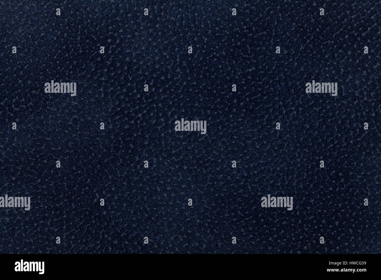 Background of dark blue fabric flock, decorated with a coat of the ...