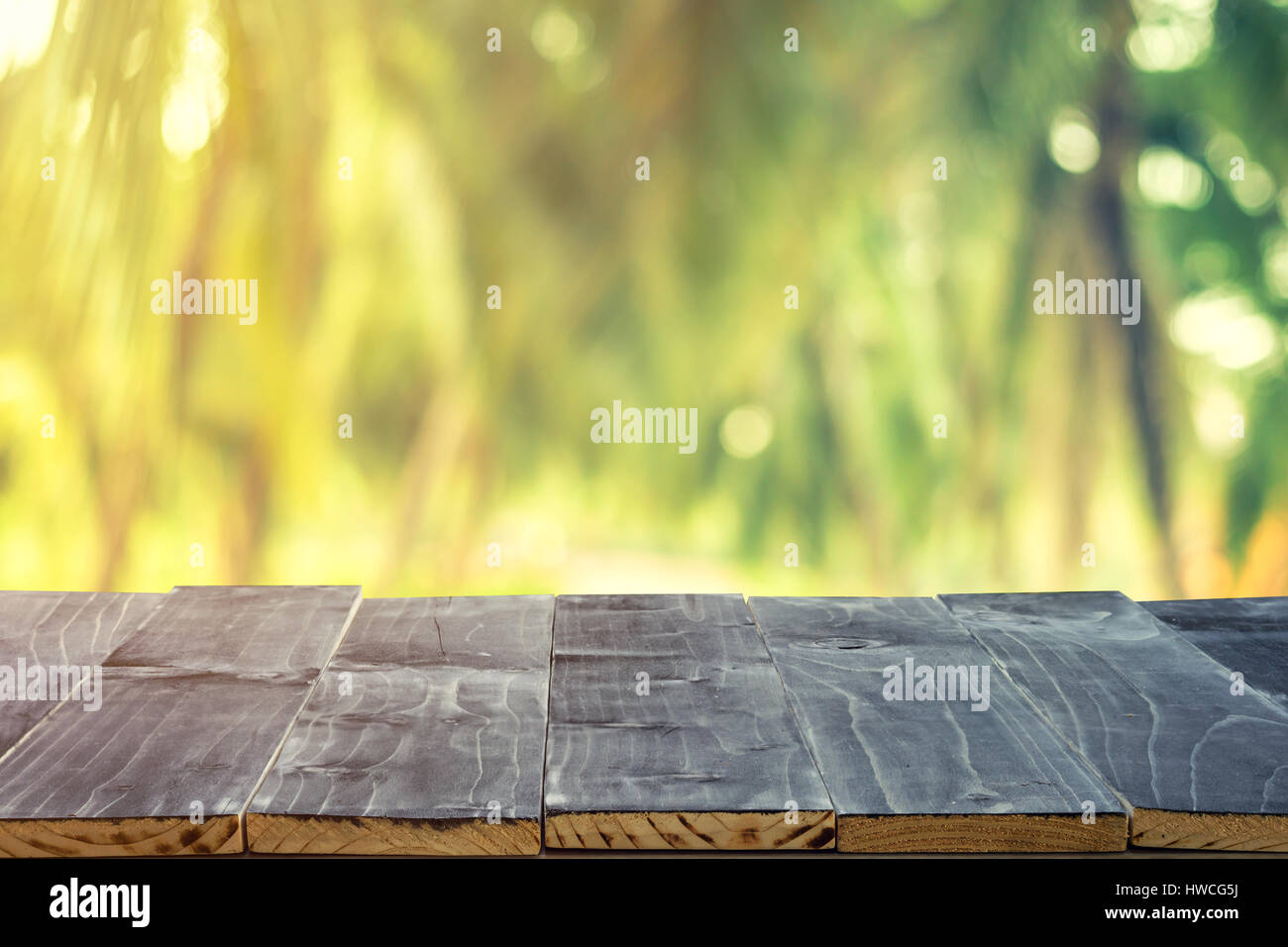 Empty wood table for product display montage and blur coconut palm on ...