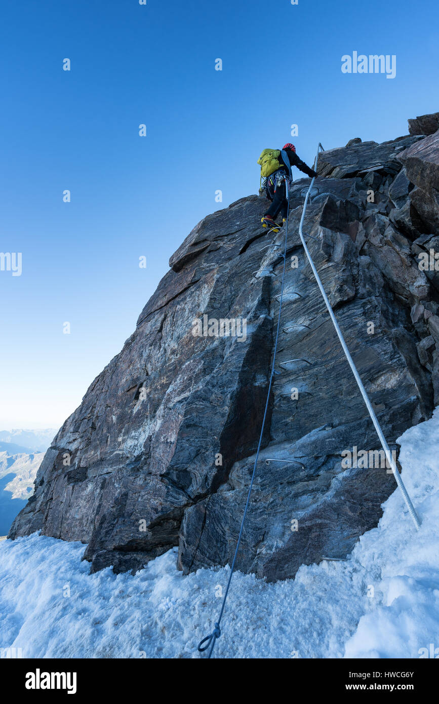 Mountain climb steep dangerous people hi-res stock photography and ...