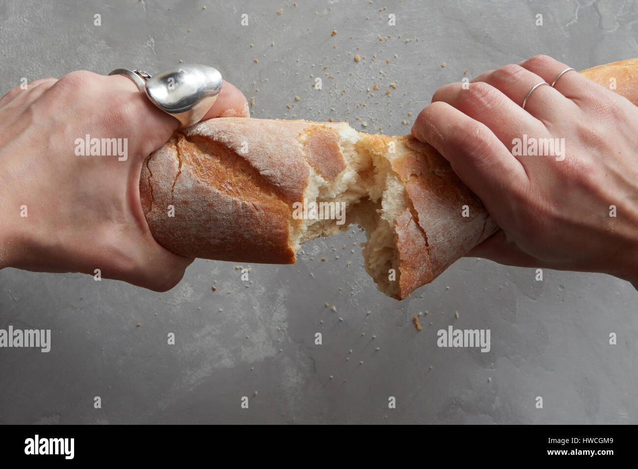 hand breaking Bread Stock Photo - Alamy