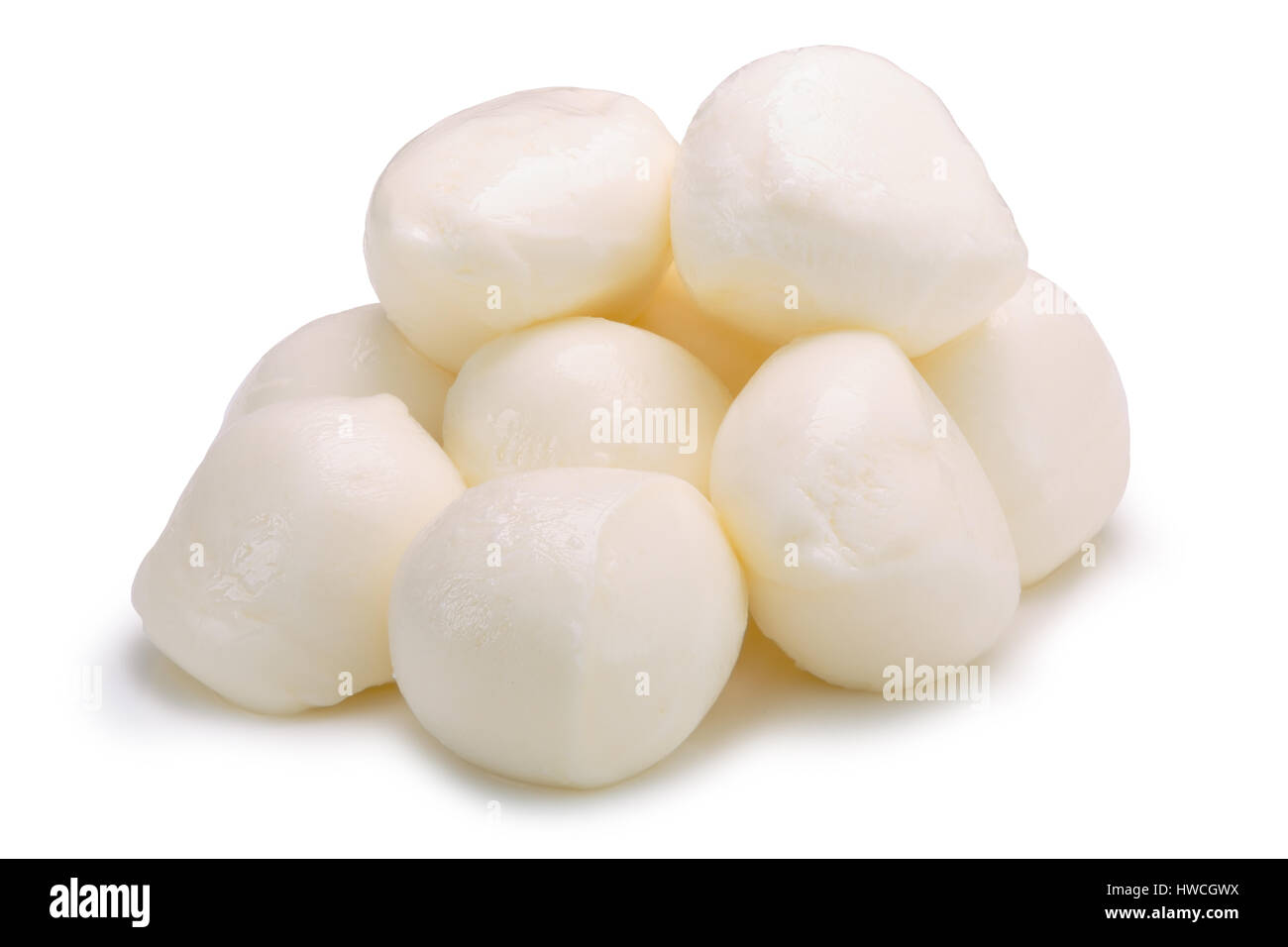 Pile of small mozzarella cheese pieces (ciliegini). Clipping paths ...
