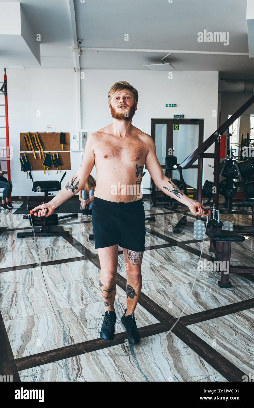 Sporty guy jumping rope hi-res stock photography and images - Alamy
