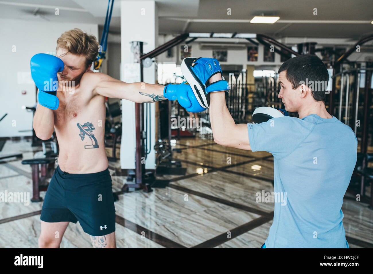 Men practicing boxing in gym Stock Photo - Alamy