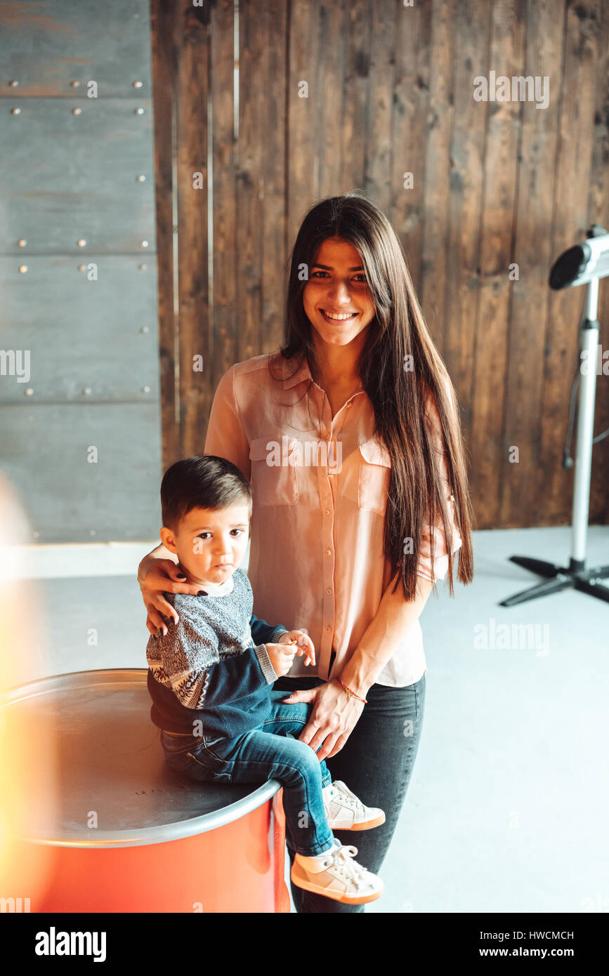 Mother and young son posing at hone Stock Photo - Alamy