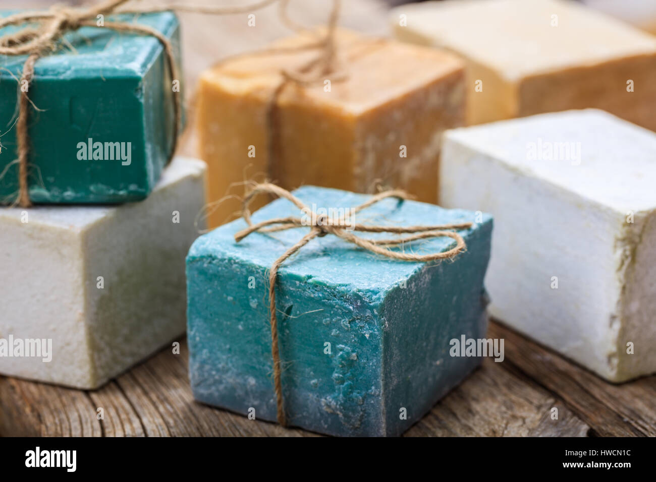 Natural handmade soap bars on wooden background Stock Photo - Alamy