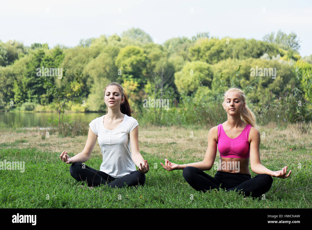 Girl in the lotus position Stock Photo - Alamy