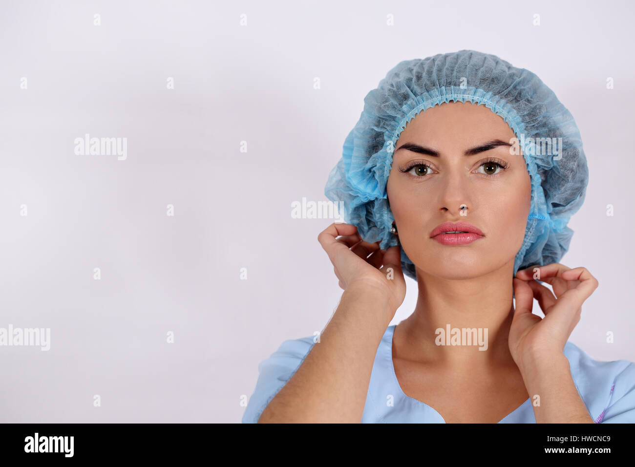 Nurse in overalls Stock Photo - Alamy
