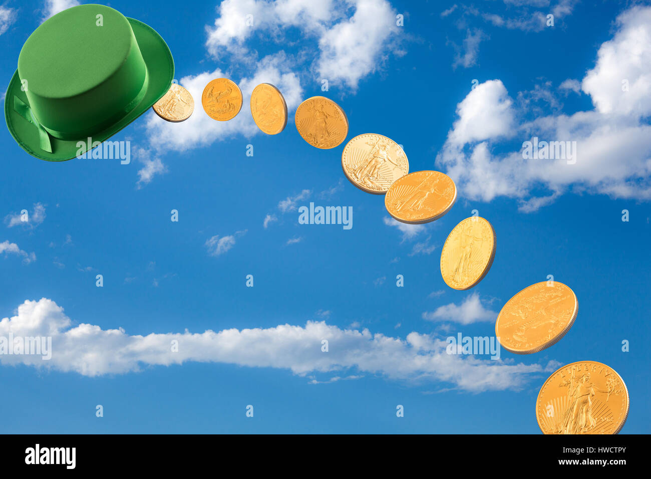 Gold coins falling hi-res stock photography and images - Alamy