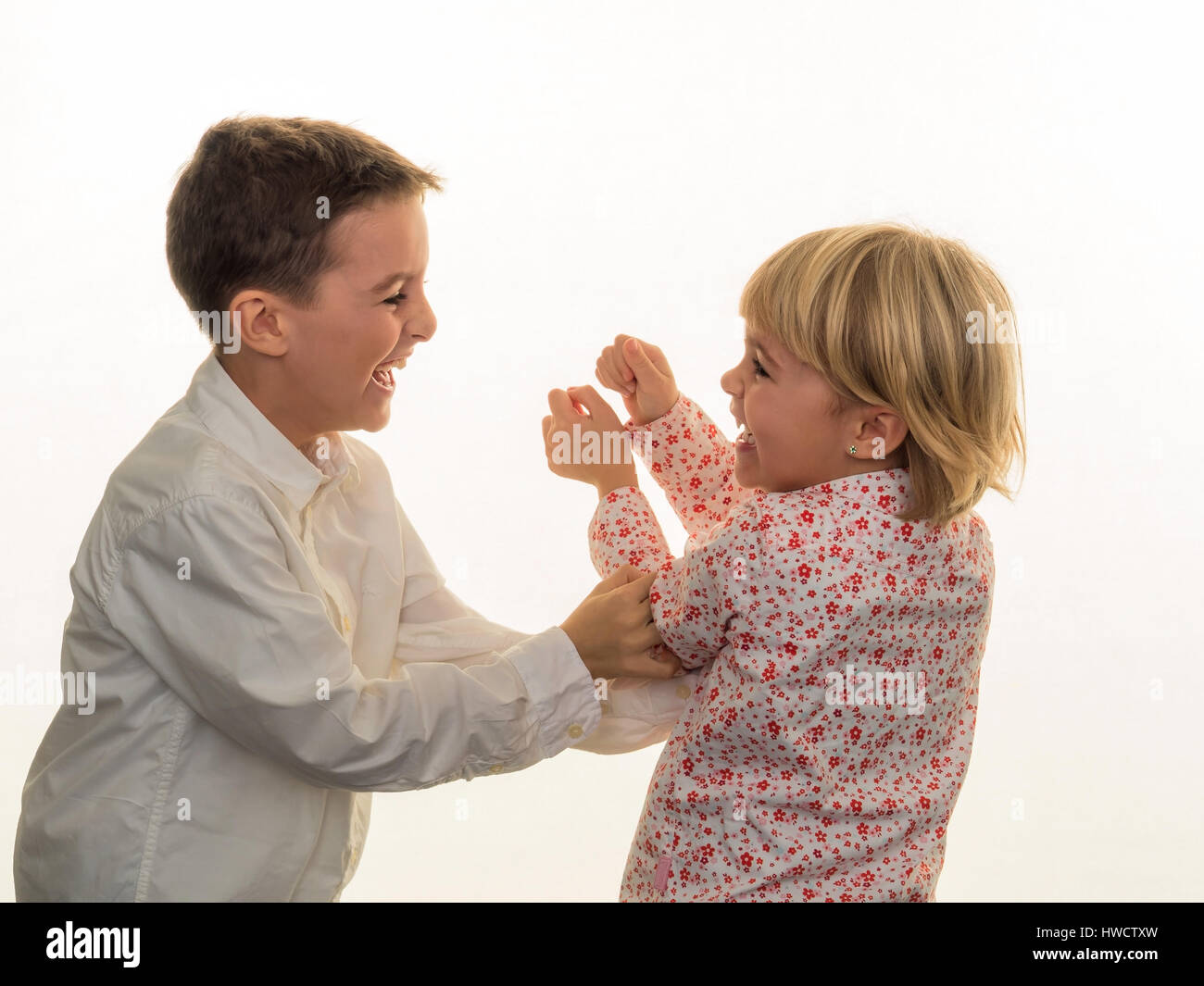 Two children with play, Zwei Kinder beim spielen Stock Photo - Alamy