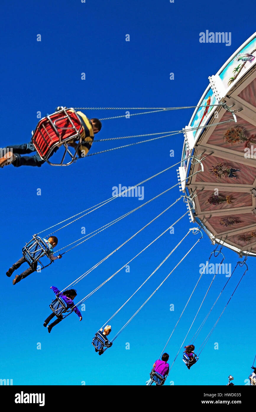 A carousel (roundabout) provides for good mood on a public festival ...