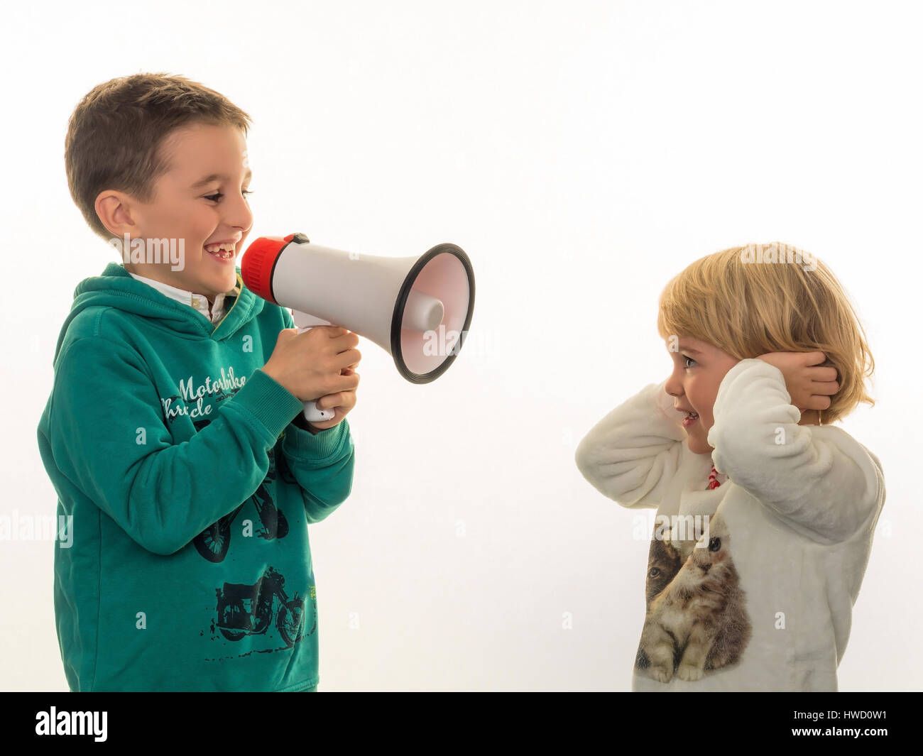 A child with a megaphone in the hand, Ein Kind mit einem Megaphon in ...