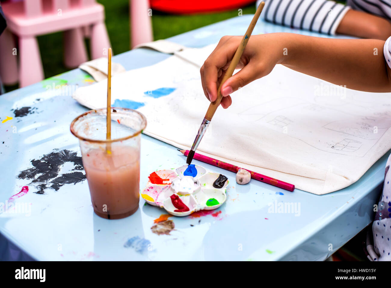 Education, Mixing Water Colors in a painting Class Stock Photo - Alamy